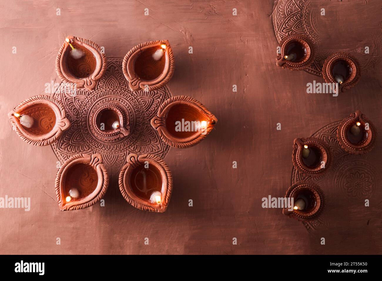 Burning diya on Happy Diwali, background for light festival of India ...