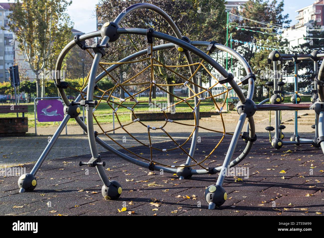 Kids playground in an urban park in Italy Stock Photo - Alamy