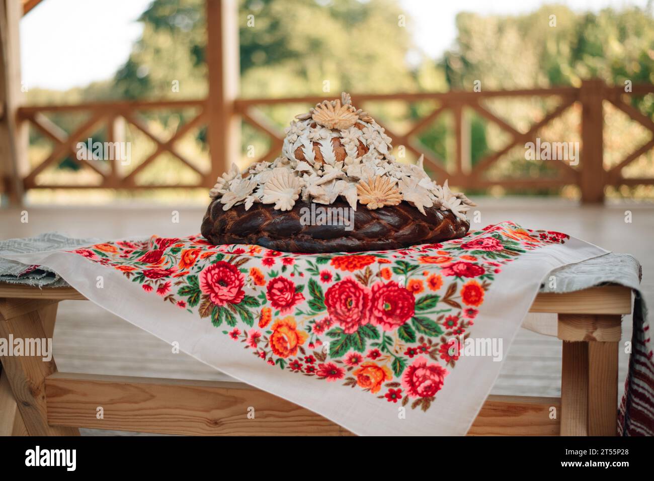 Wedding loaf. Wedding bread. A loaf is decorated with flowers of dough ...