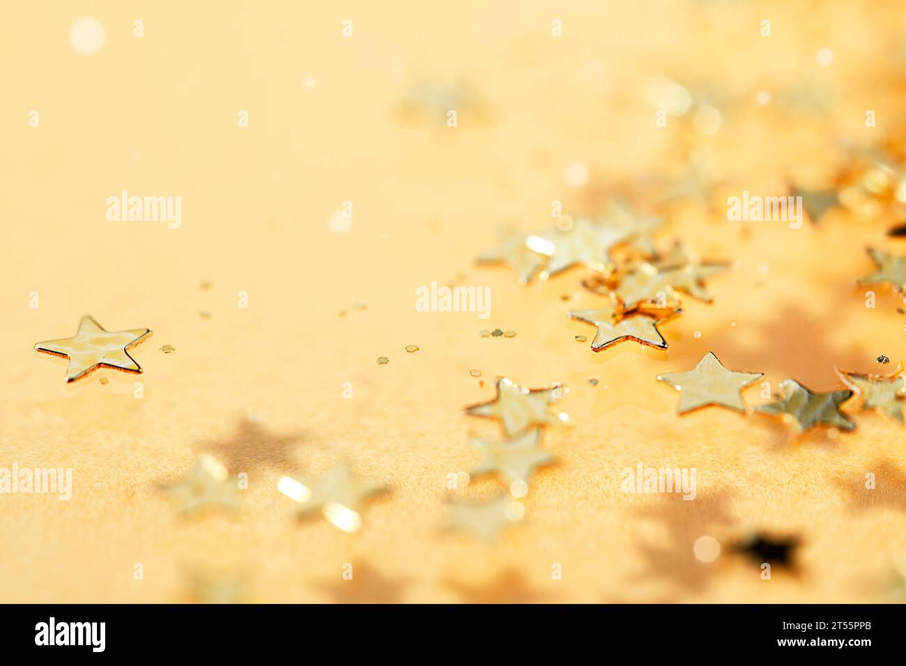 Golden stars scatter and glitter sparking. Blinking confetti ...