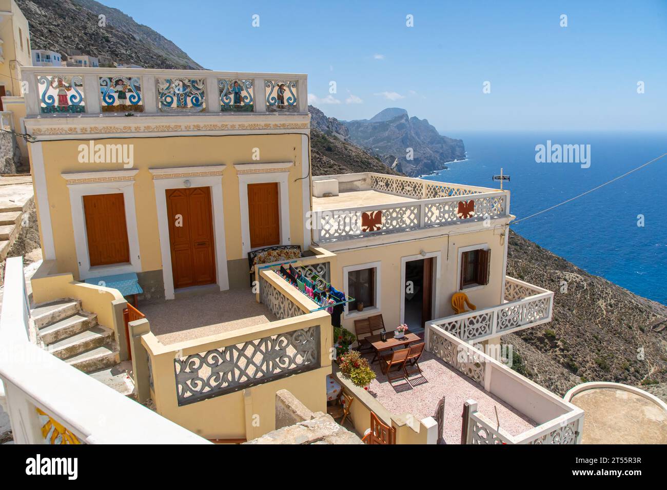 A house hanging over a cliff in Olympos,Karpathos Stock Photo - Alamy