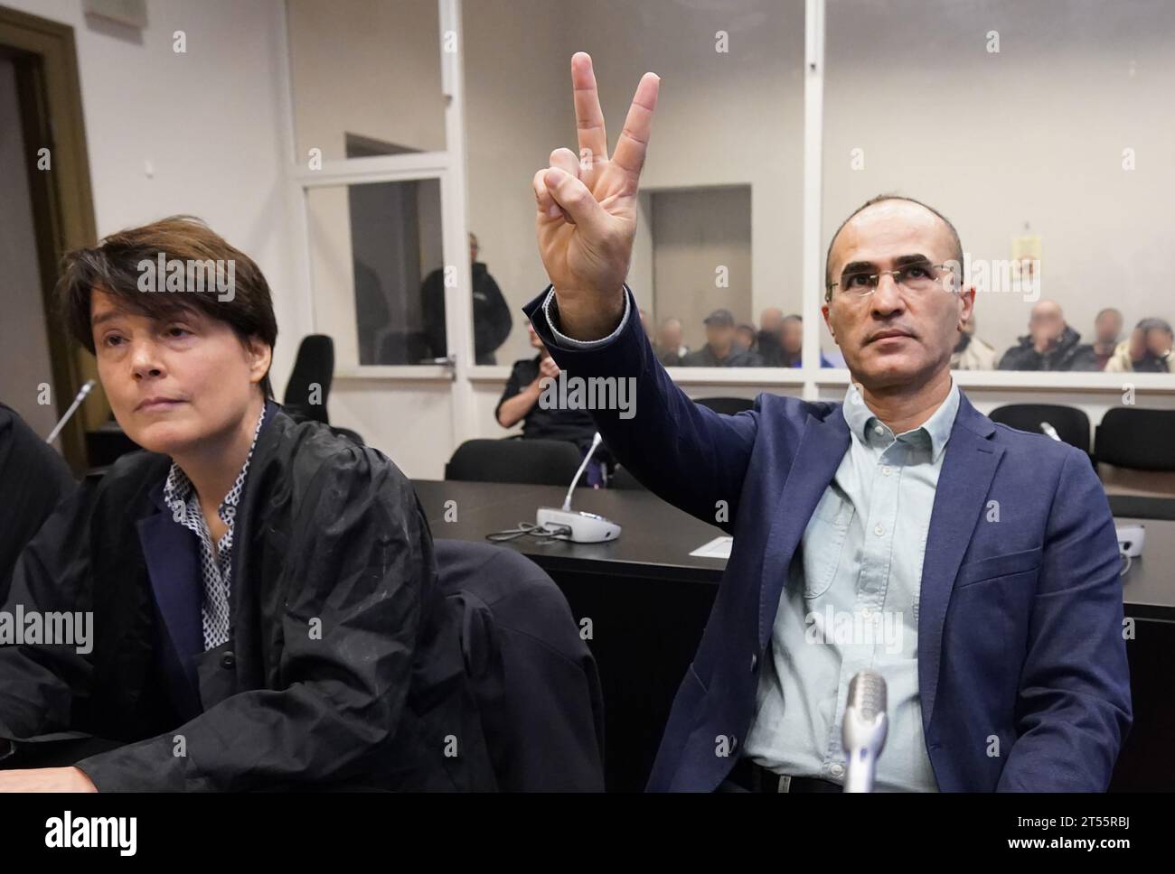 Hamburg, Germany. 03rd Nov, 2023. The defendant sits next to his lawyer ...