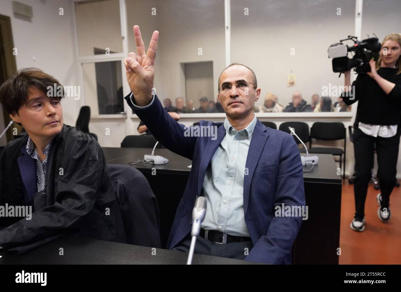 Hamburg, Germany. 03rd Nov, 2023. The defendant sits next to his lawyer ...