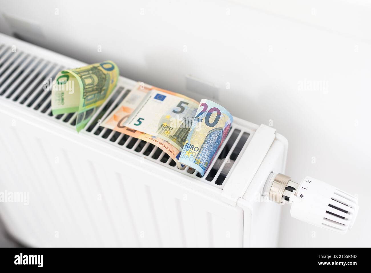 Banknote Lying On The Radiator The Concept Of Rising Energy Prices And