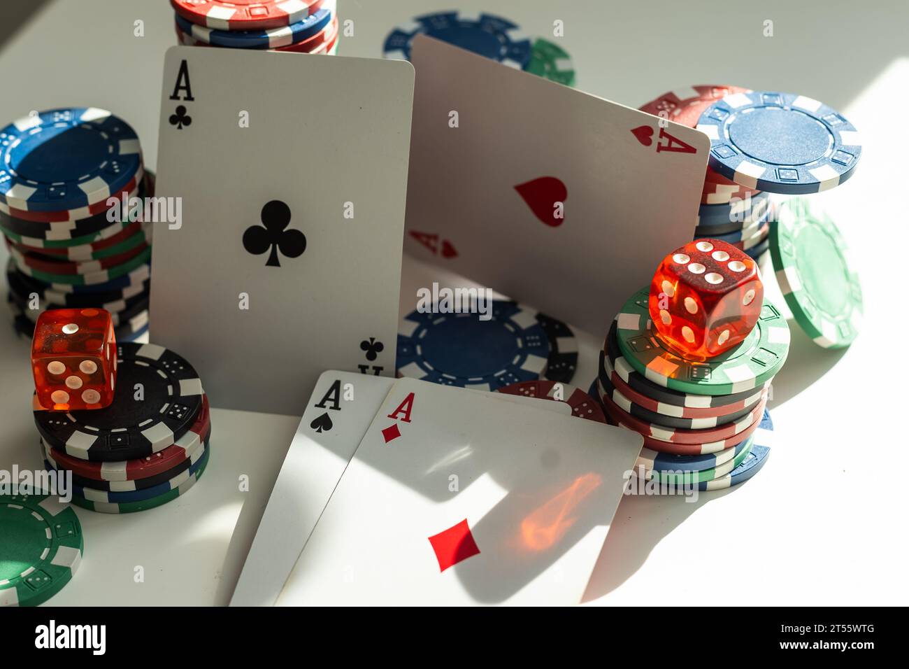 four aces with poker chips on white background Stock Photo - Alamy