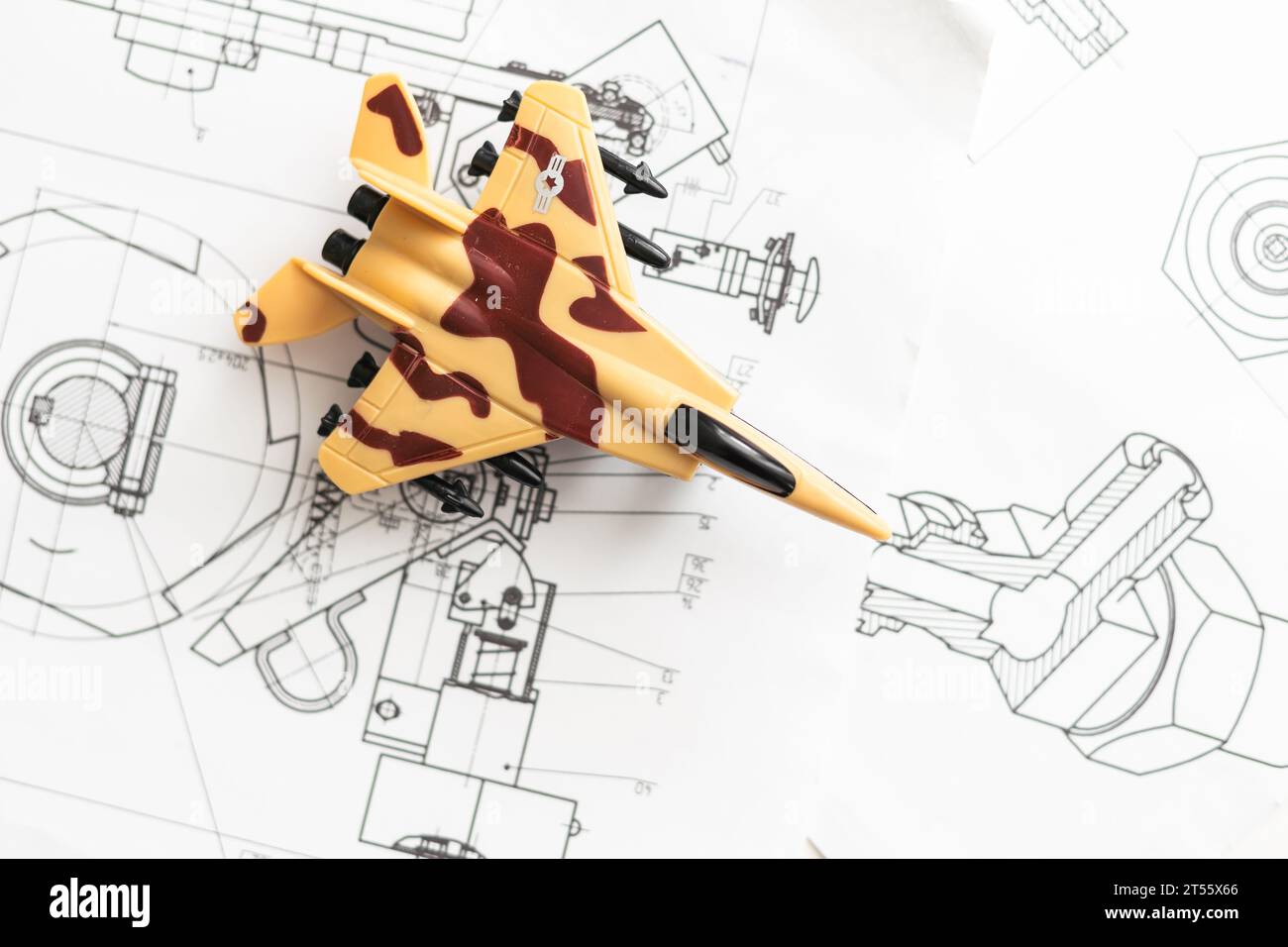 Planning a military operation on a map of the terrain using figures of ...