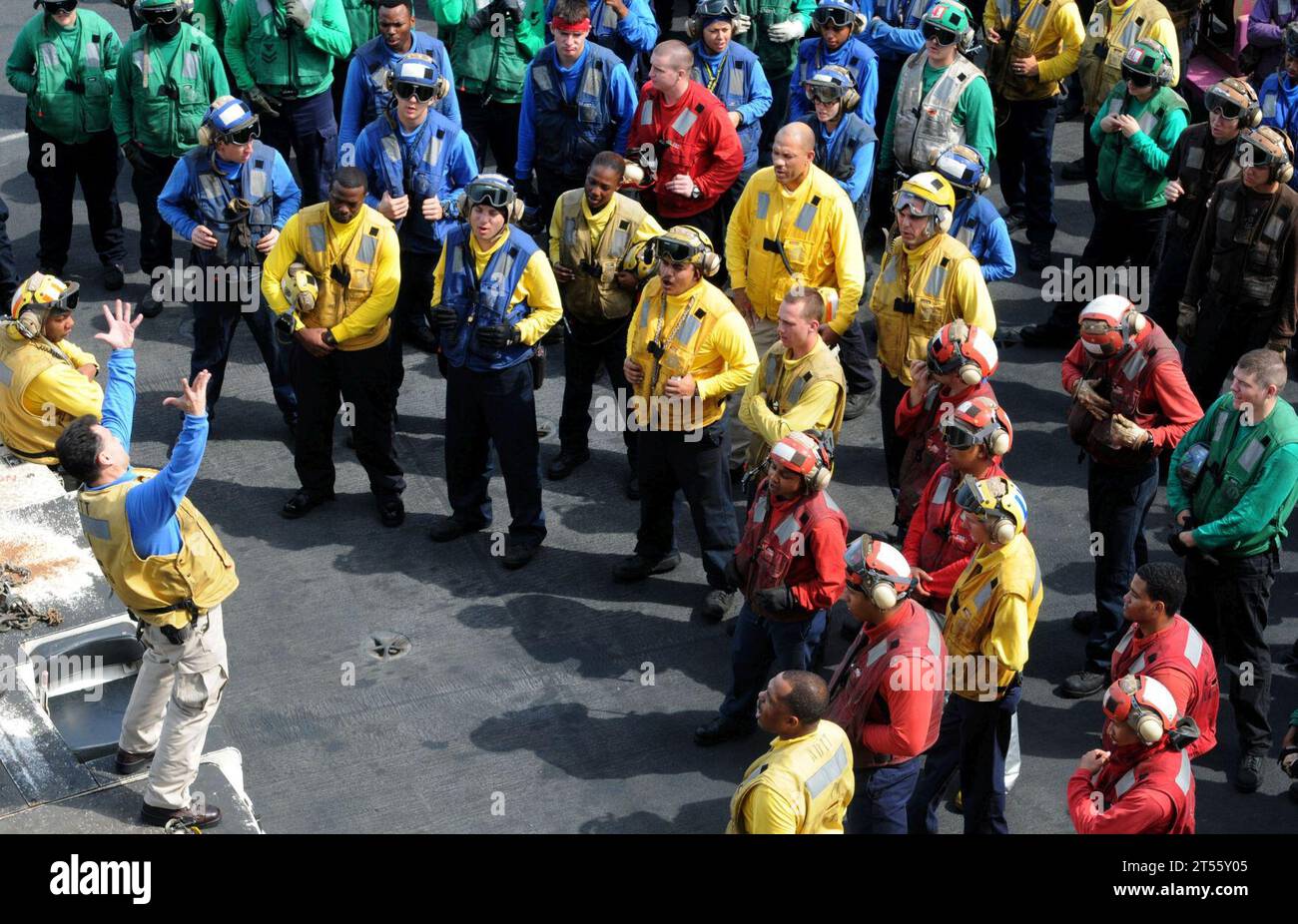 Martin jimenez gives sailors safety brief prior to flight deck hi-res ...