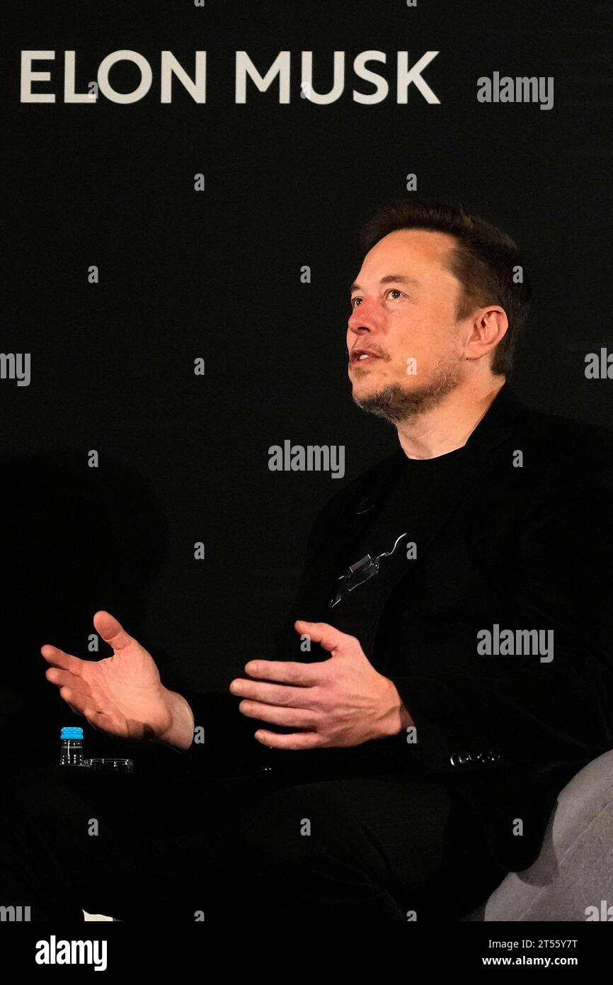 Elon Musk, CEO of Tesla and SpaceX laughs during an 'in-conversation ...