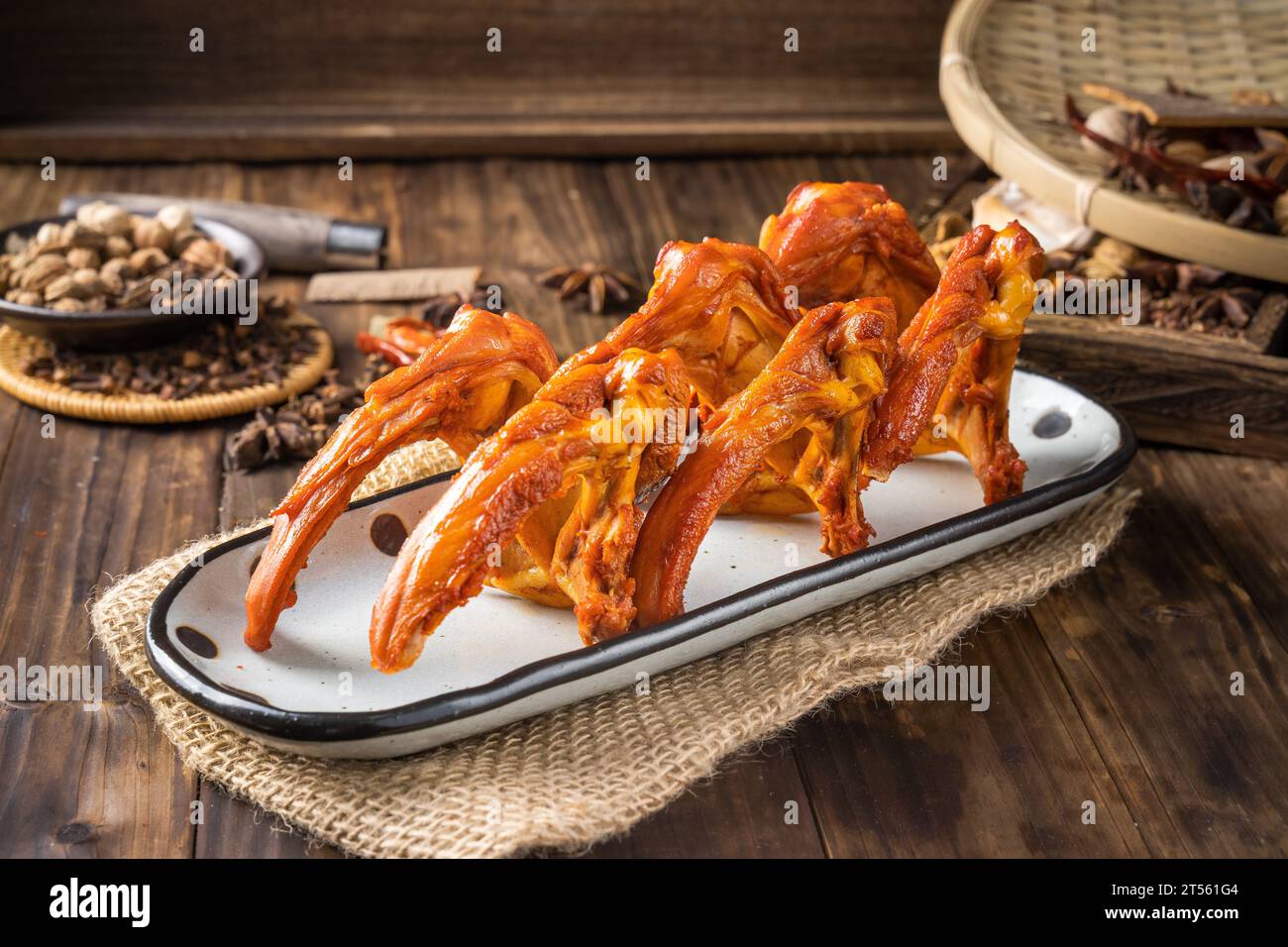 Marinated duck Clavicle bone in Spiced Sauce Stock Photo - Alamy