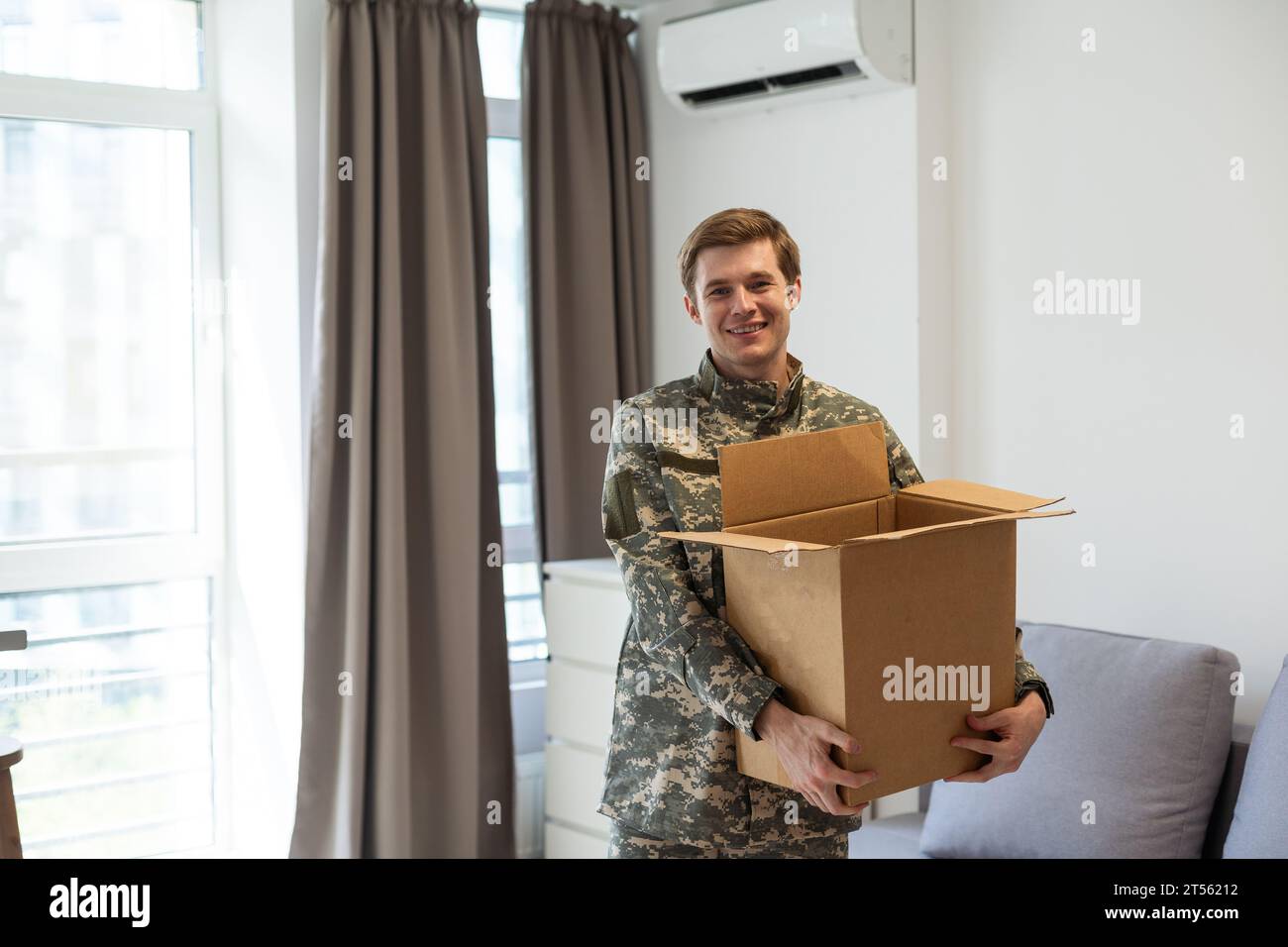 Unrecognizable homeless man holding hi-res stock photography and images ...