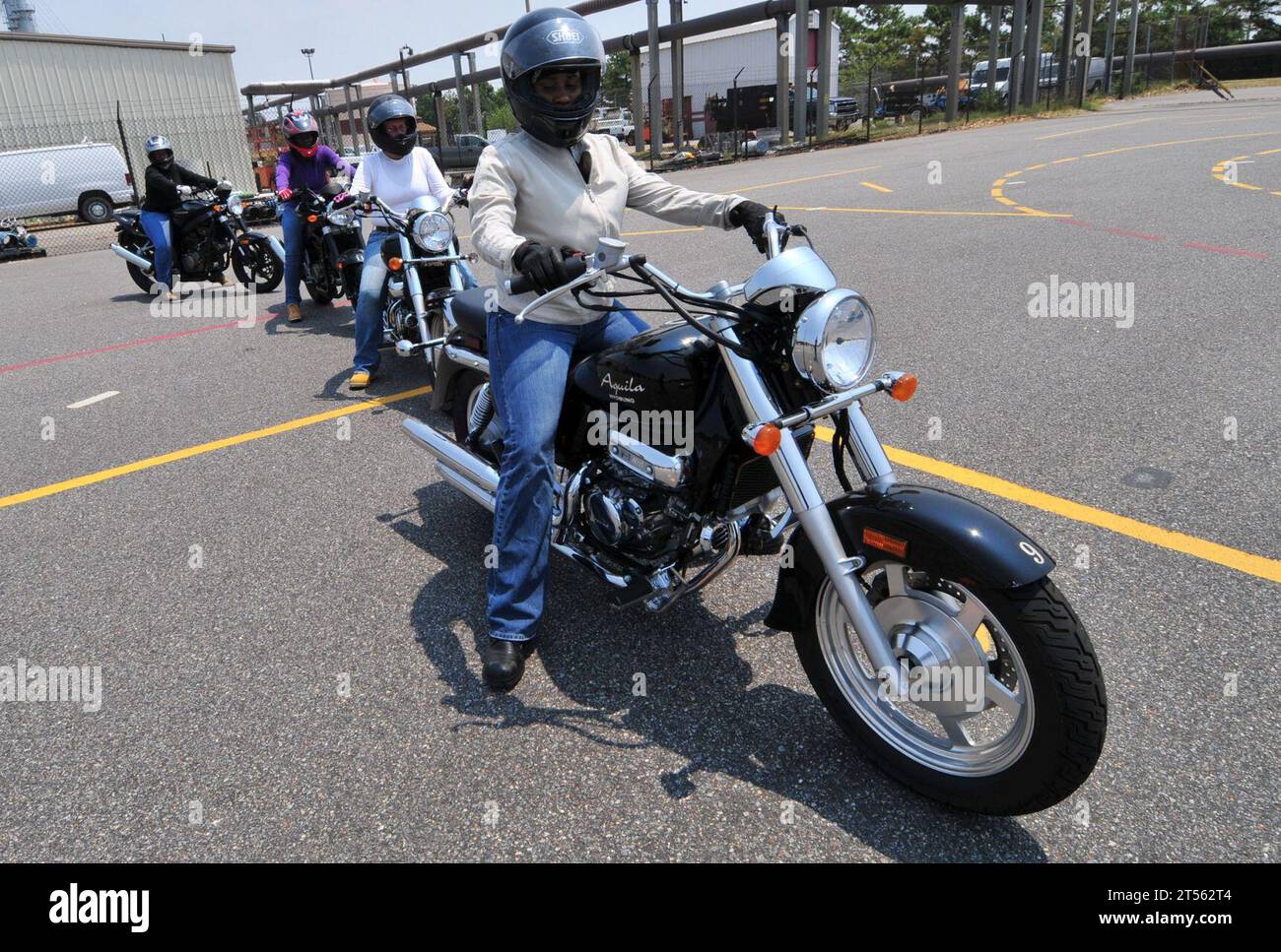 Motorcycle Safety, students, women Stock Photo - Alamy