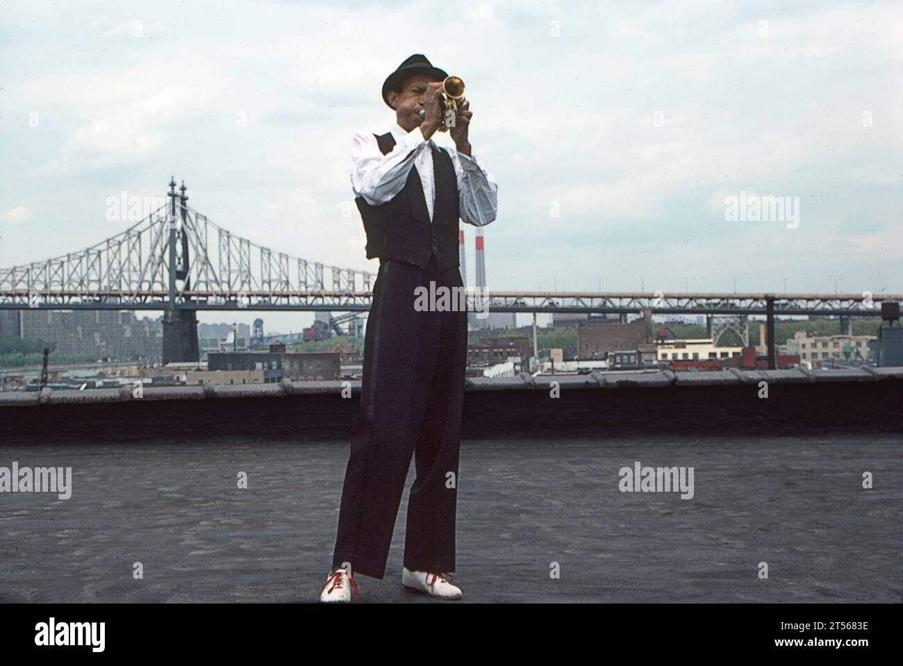 A 1983 portrait of jazz trumpeter Don Cherry playing his pocket trumpet ...
