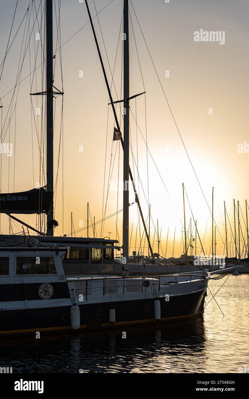 Harbor at sunset Stock Photo - Alamy