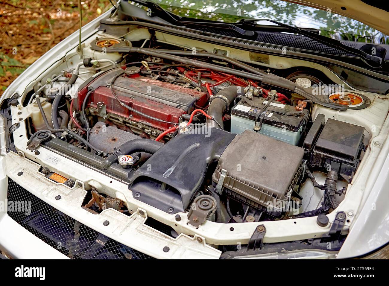 Car engine with opened hood. Car service conceptual photo Stock Photo ...