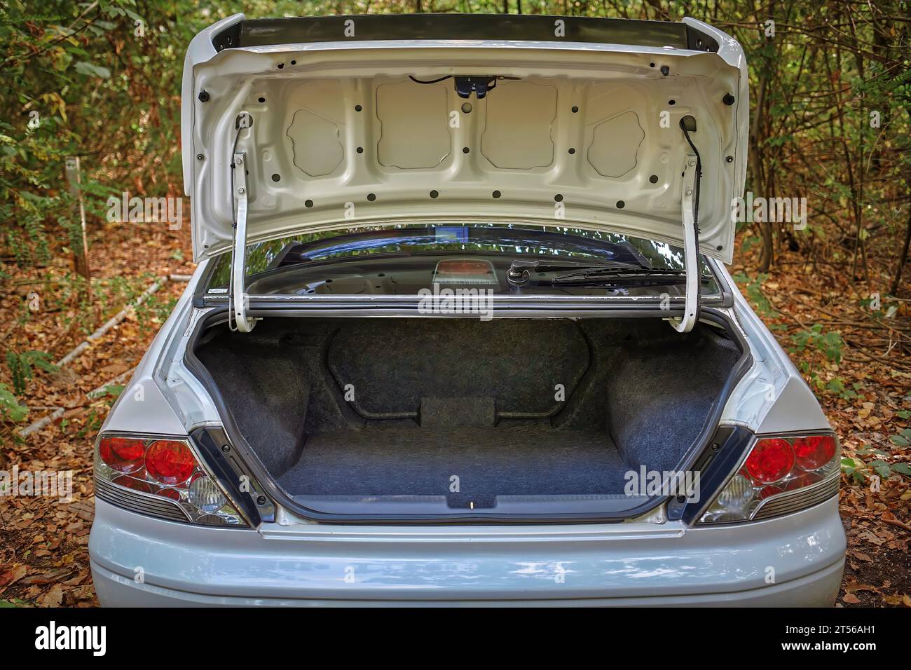 Opened car trunk, city car empty trunk Stock Photo - Alamy