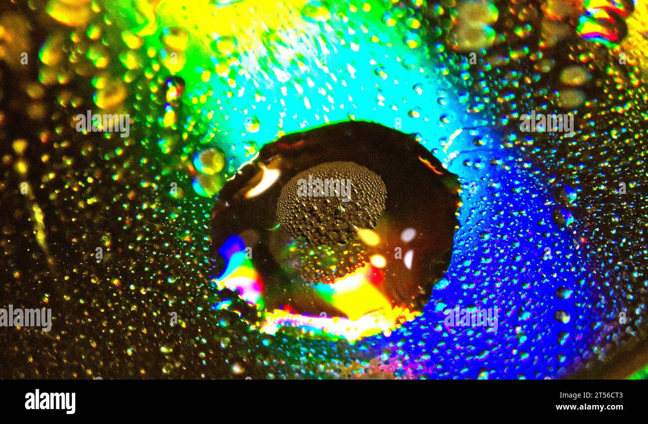 Water drops on DVD in prism perspective Stock Photo - Alamy