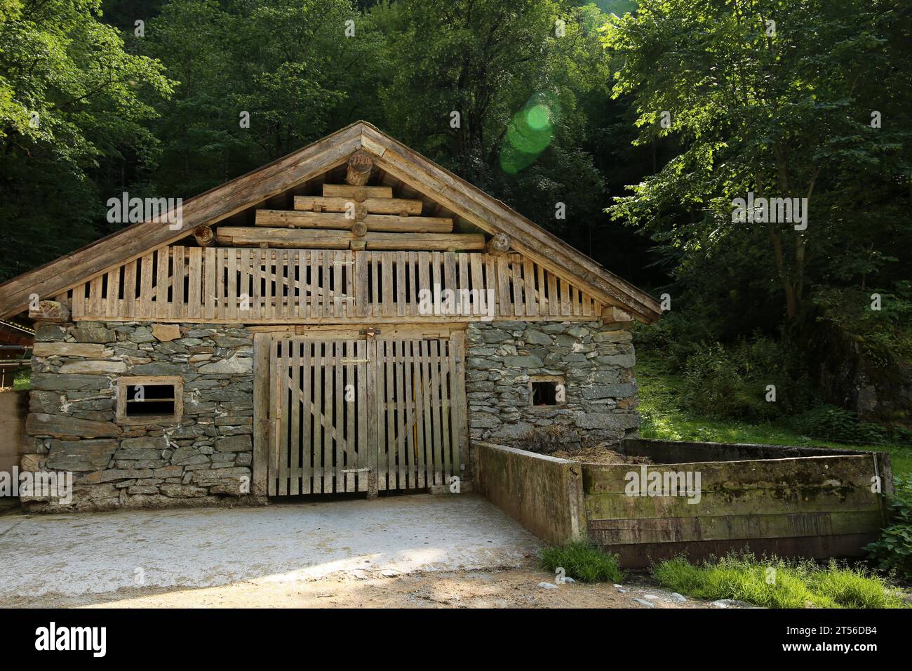 Stable building made of stone and wood in Pinzgau Stock Photo - Alamy