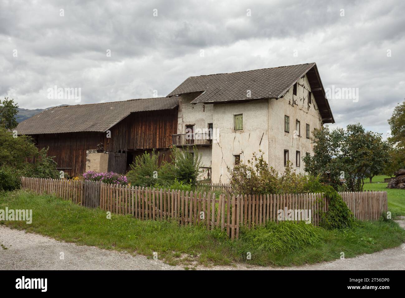 very old abandoned farm among a pasture in Val Gardena Stock Photo - Alamy