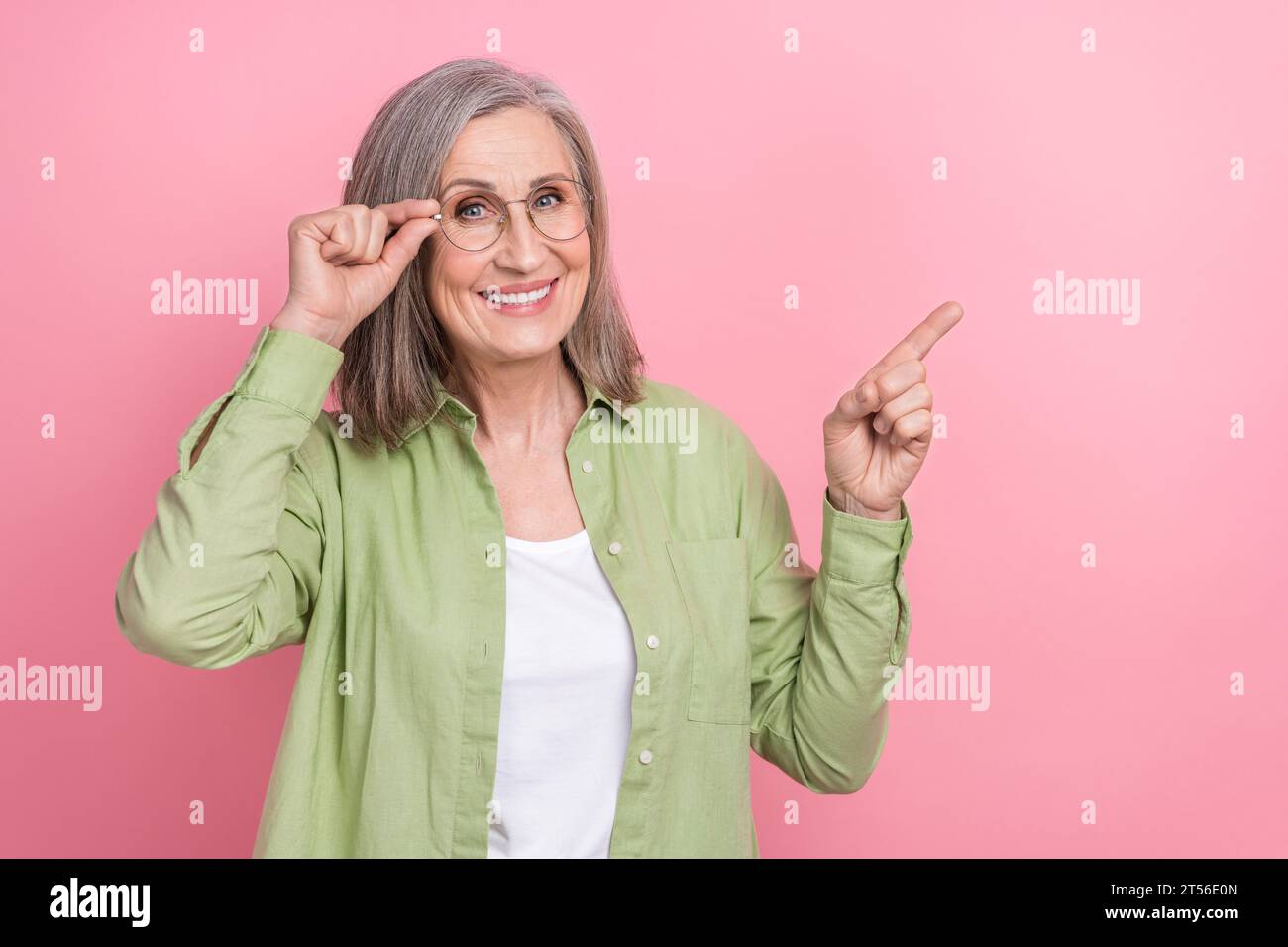 Photo of grandmother teach create wikipedia page for free touch her spectacles direct finger ...