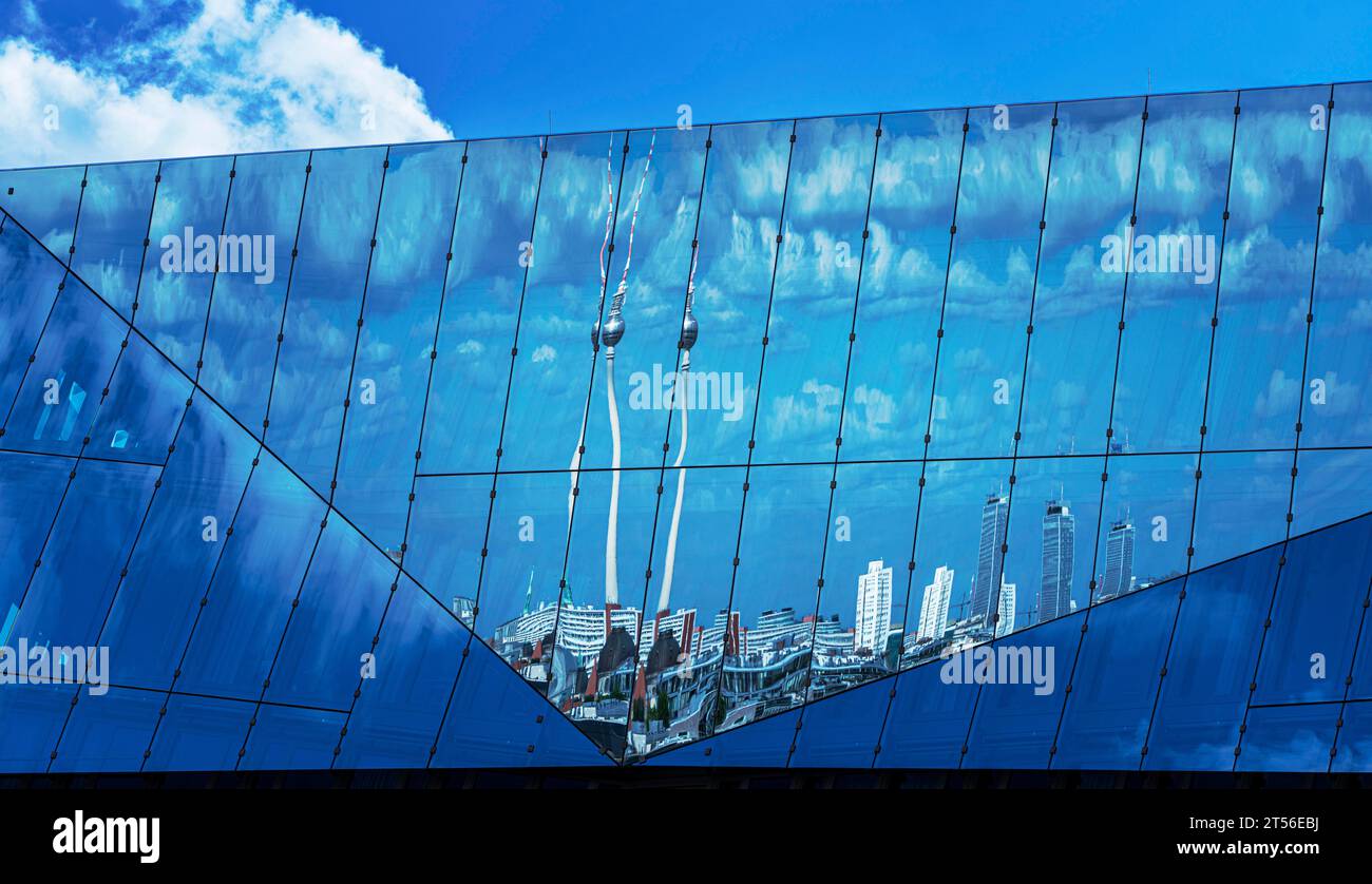 Reflection of the TV tower in the glass facade of the Cube at the main ...