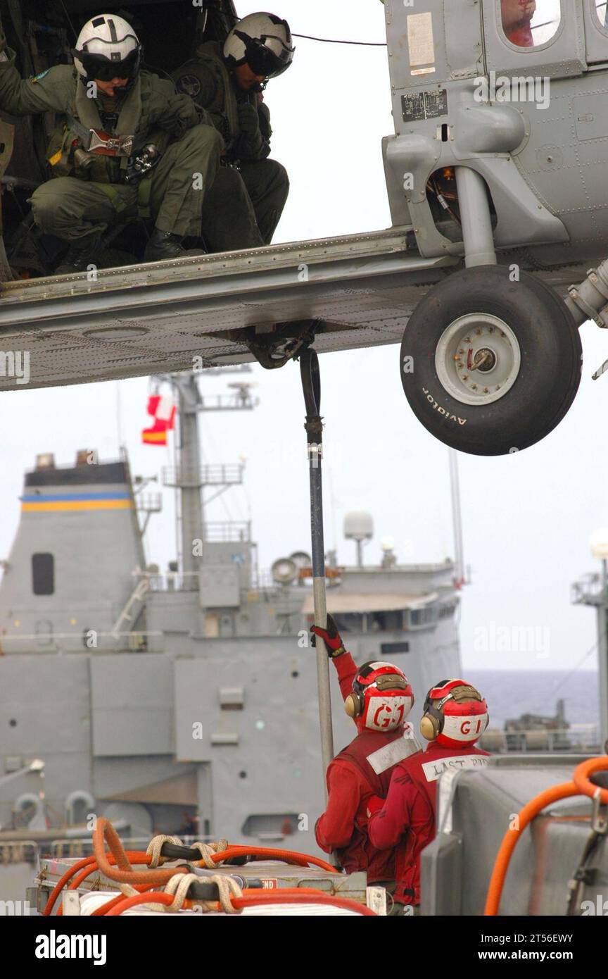 RAS, supplies, t-ae 26, USNS Flint, USS Kitty Hawk, weapons off load ...