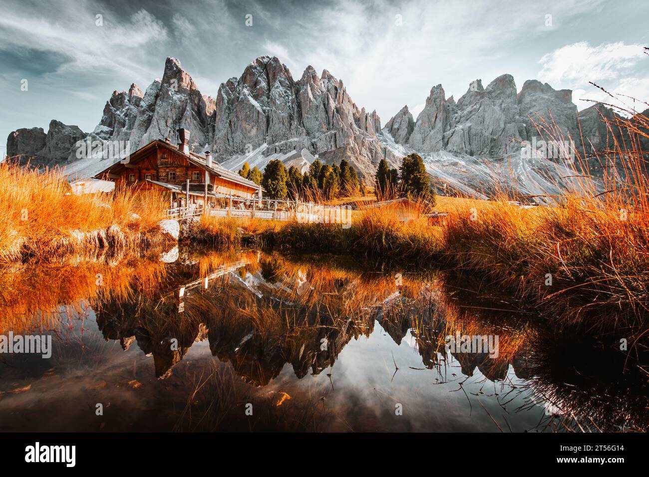 Scenic view of Geisler Alm Rifugio delle Odle in front of dolomites ...