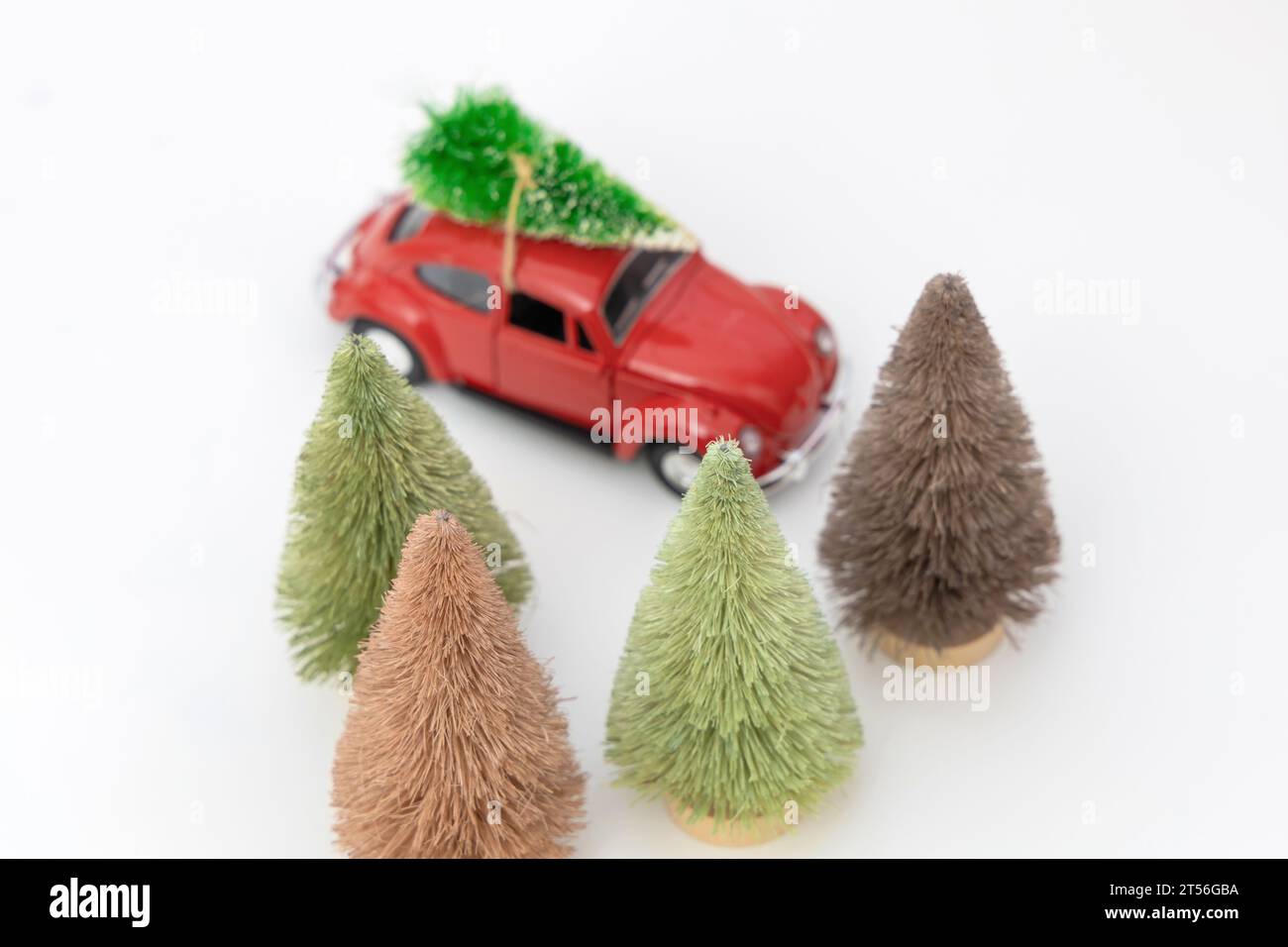 Vintage red car decor with Christmas Tree. Transporting Christmas tree ...