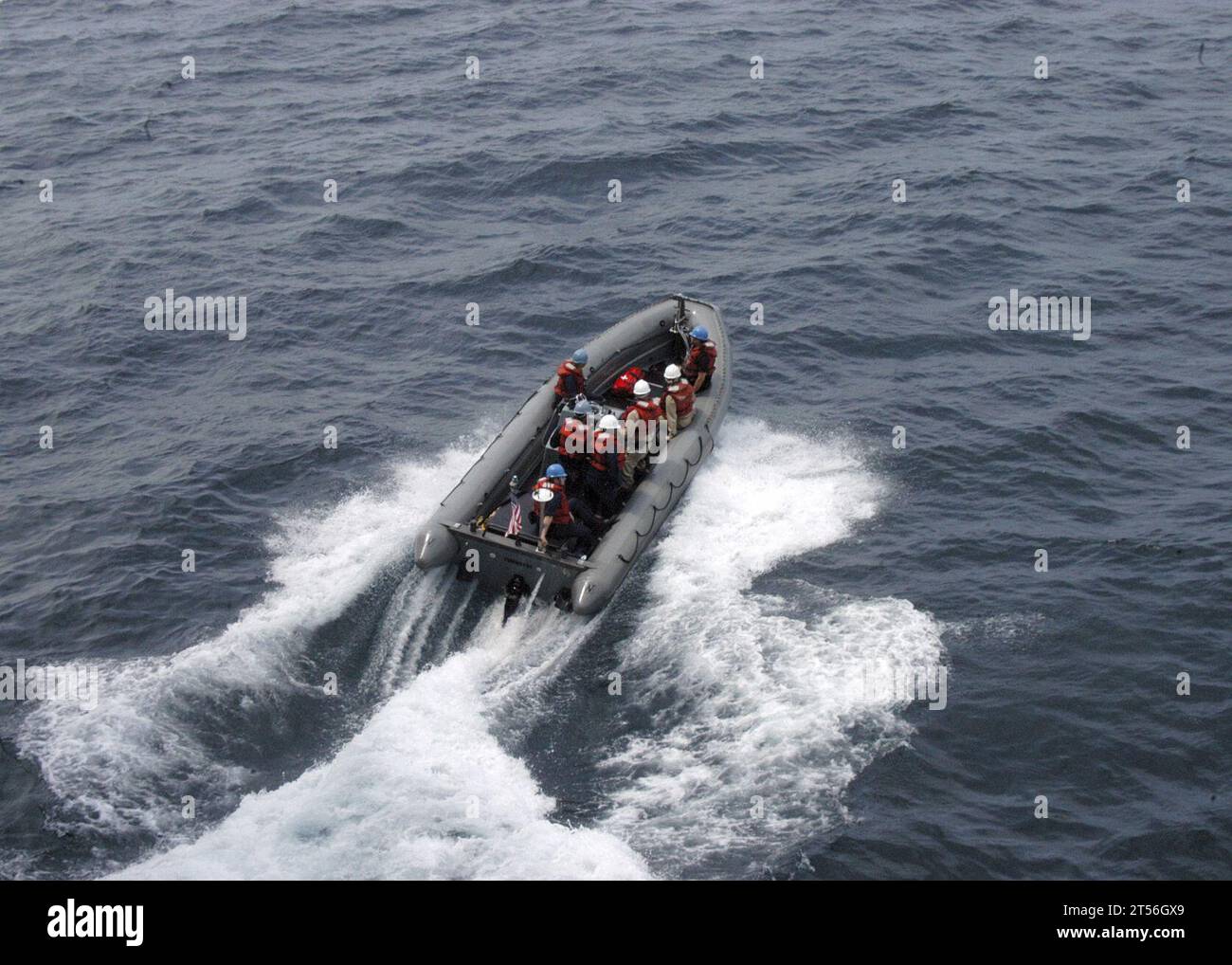 Sailors from the amphibious assault ship USS Bataan (LHD 5) deck ...