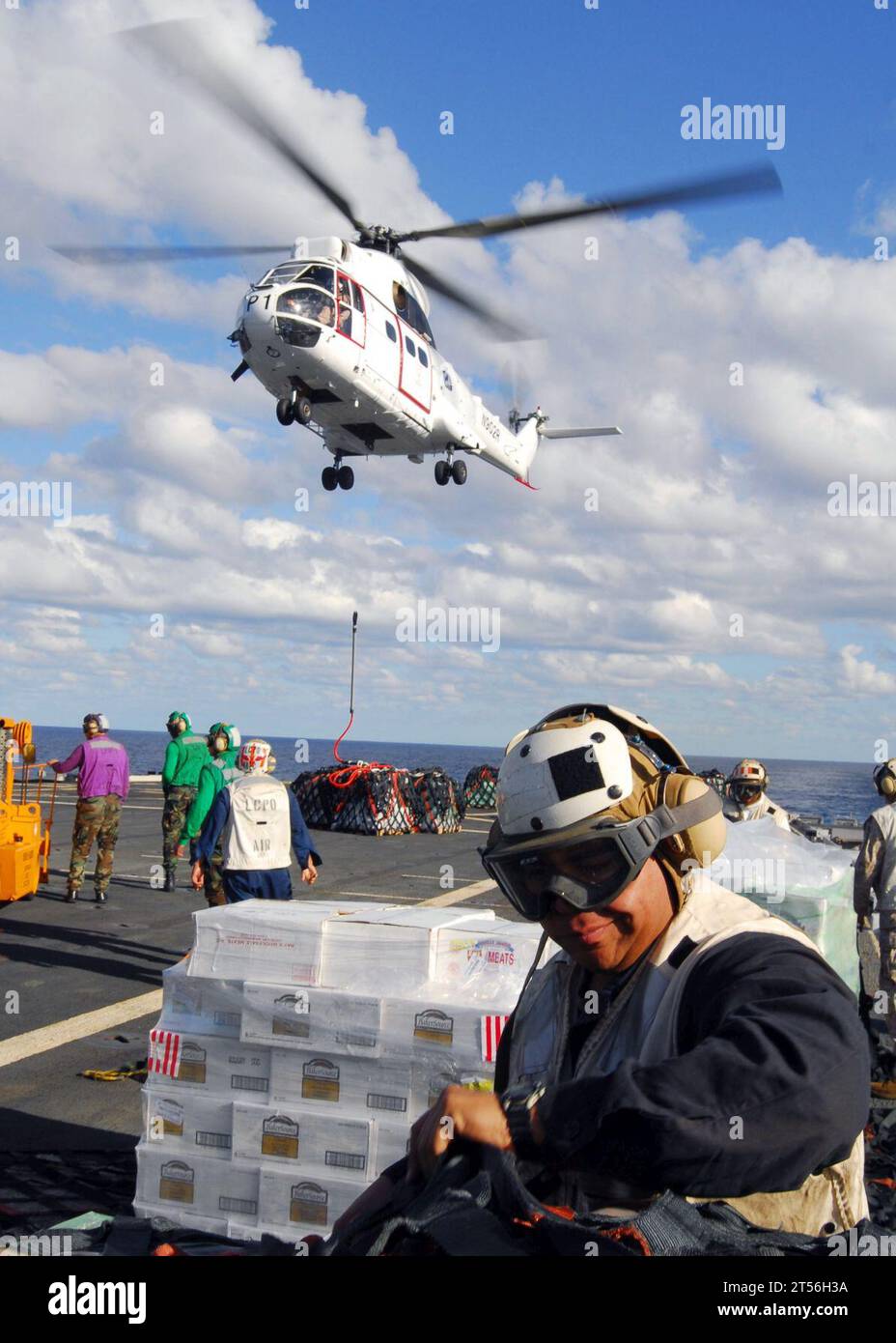 Sailors, supplies, USNS Amelia Earhart (T-AKE-6), USS Denver (LPD 9 ...