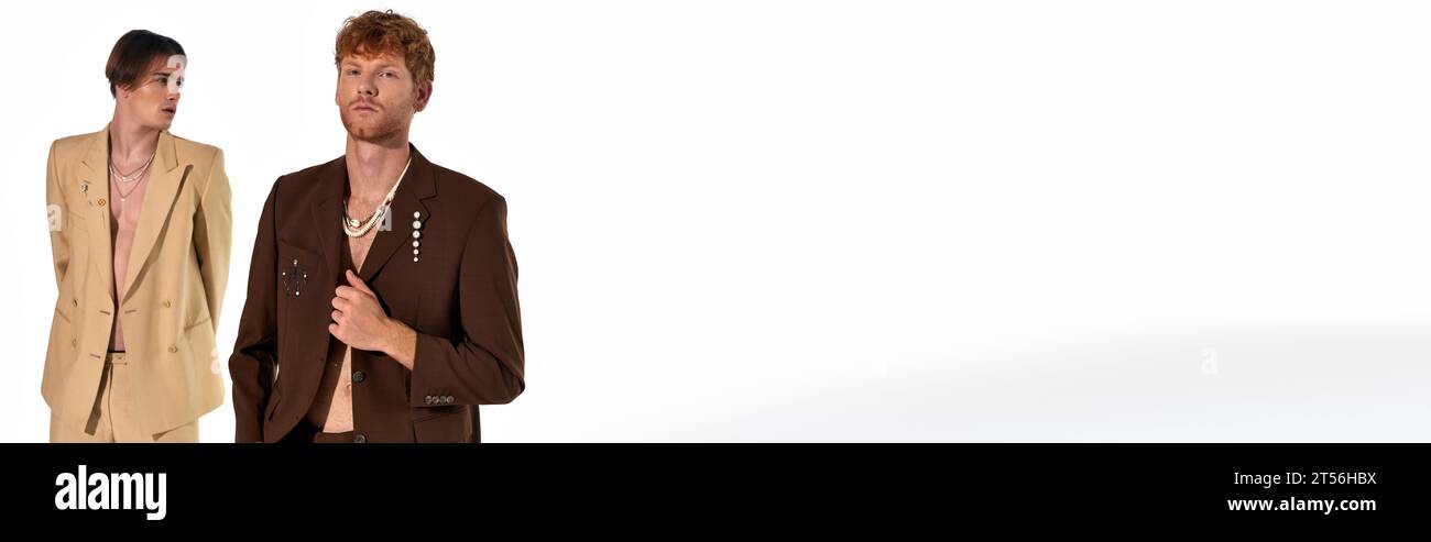 good looking classy men in elegant attires posing on white backdrop ...