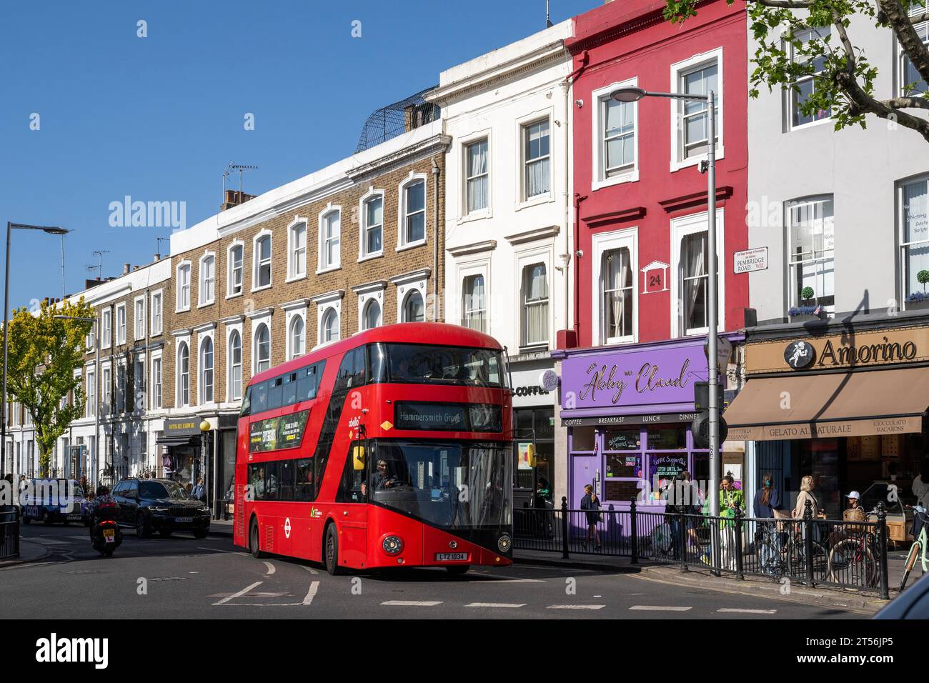 Red double-decker bus, terraced houses, Prembridge Road, Notting Hill ...