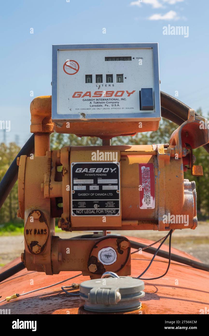 Old Gasboy diesel fuel pump connected to top of dispenser tank, Quebec ...
