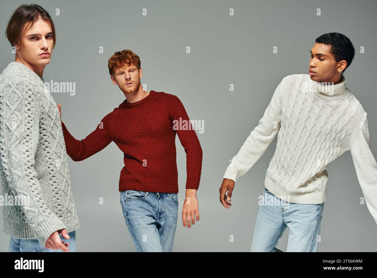 Three men posing hi-res stock photography and images - Alamy