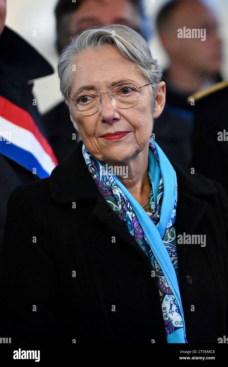 Prime minister Elisabeth Borne greets staff as she visits a fire station after storm Ciaran ...