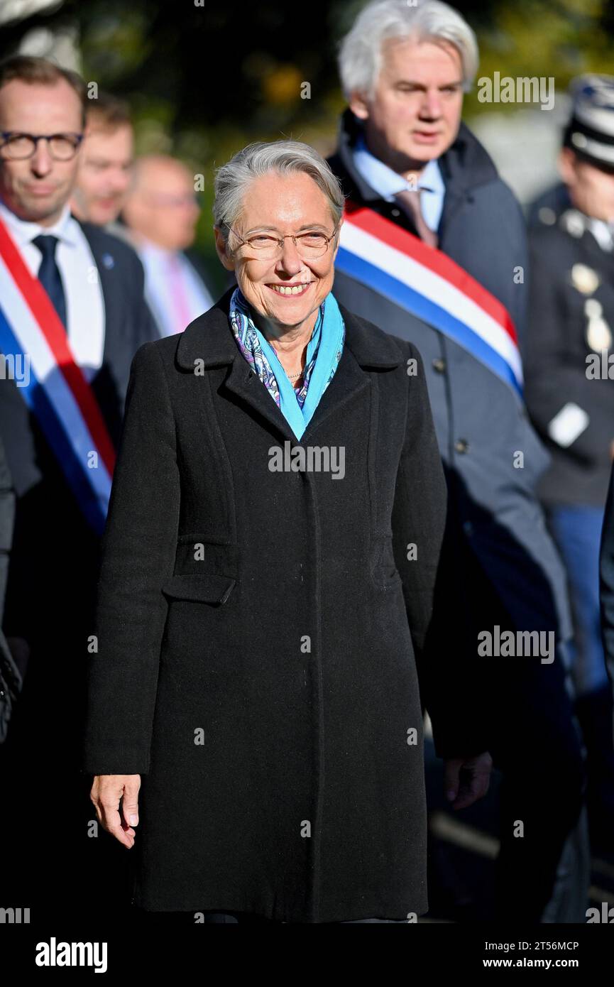 Prime minister Elisabeth Borne greets staff as she visits a fire station after storm Ciaran ...