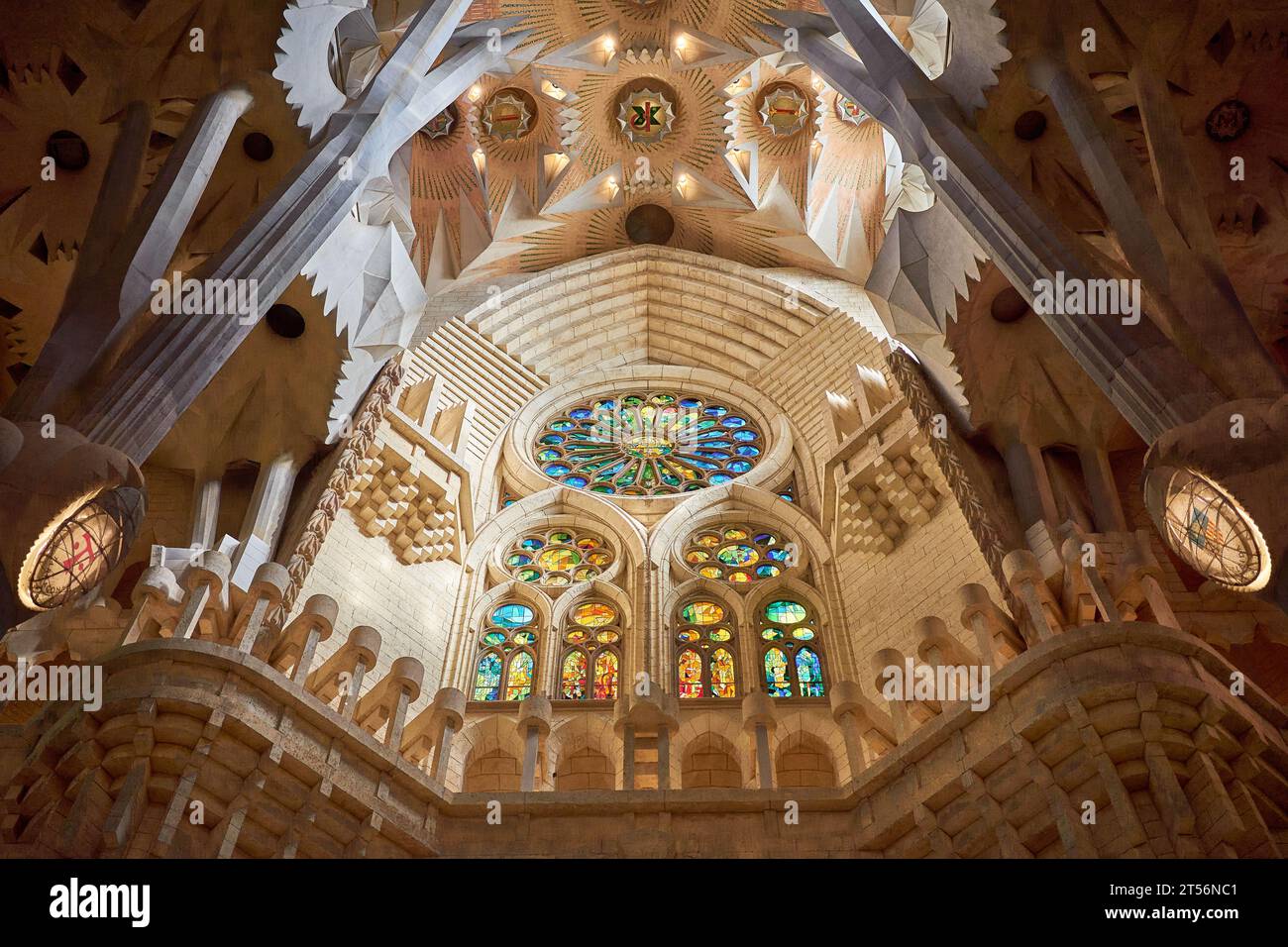 Looking up at the rose window of the Nativity facade of the Sagrada ...
