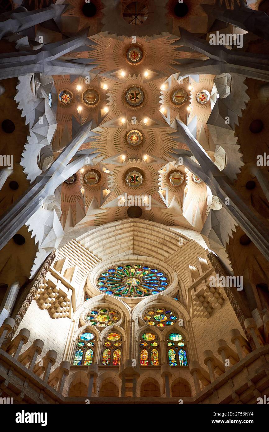 Looking up at the rose window of the Nativity facade of the Sagrada ...