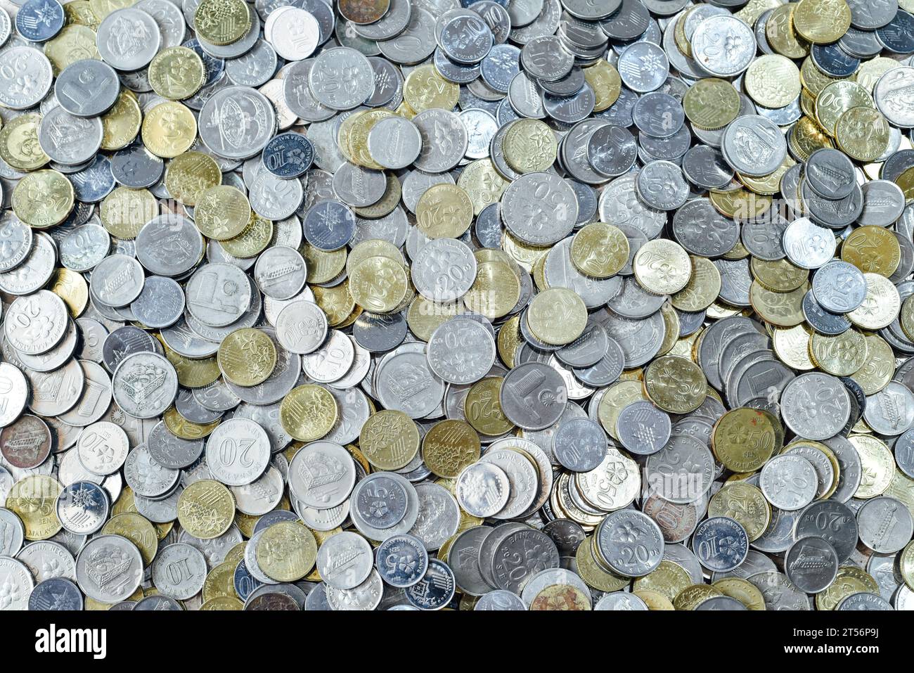 Coins of various sizes and denomination Stock Photo - Alamy