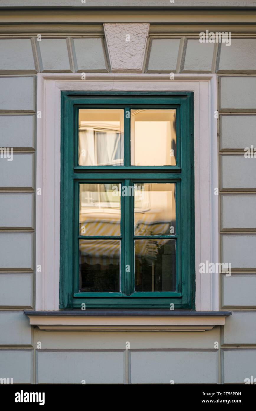 Window with reflections of an old, traditional house, Vienna, Austria ...