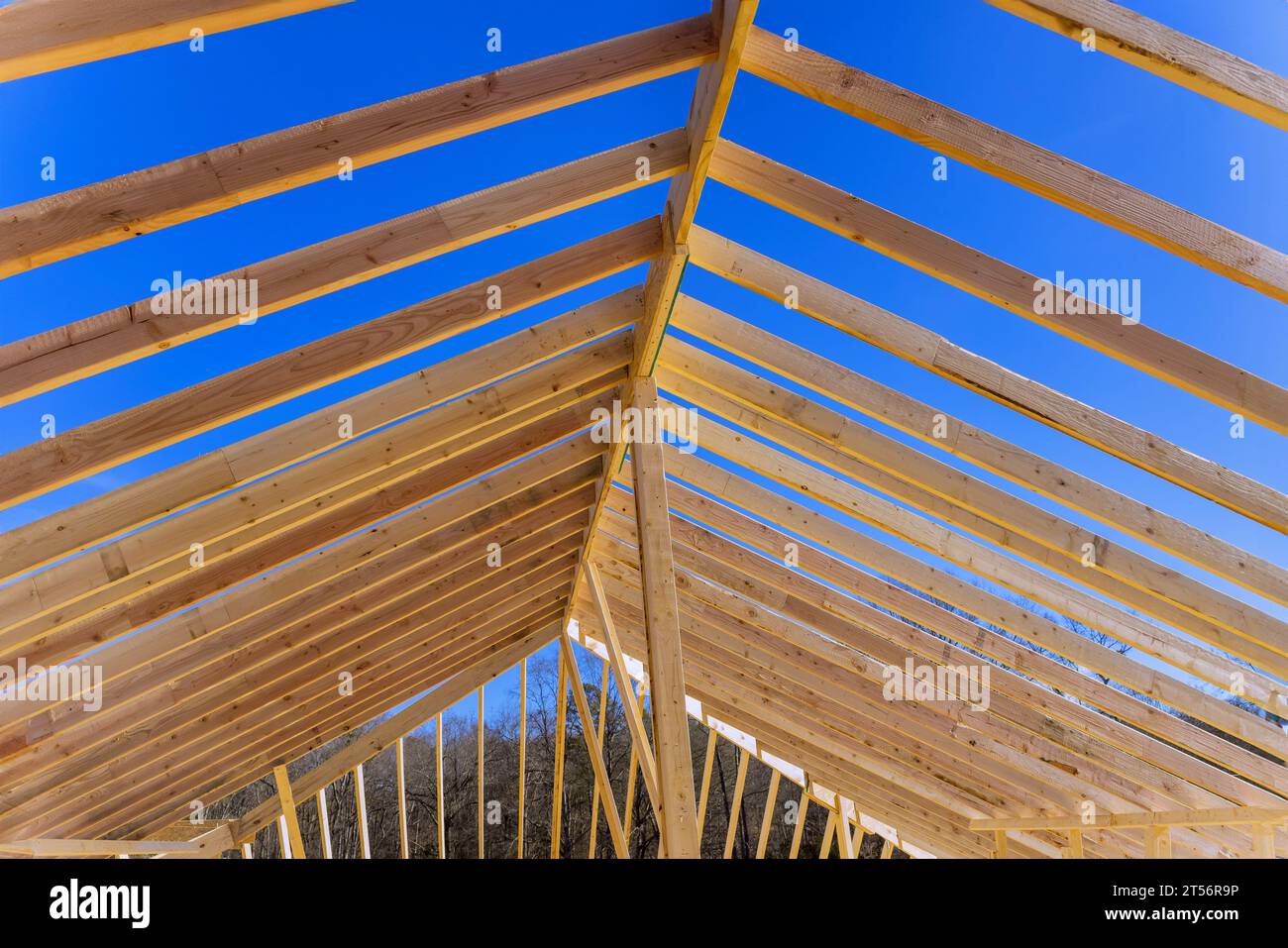 Constructing new house roofing frame with wooden support beams Stock ...