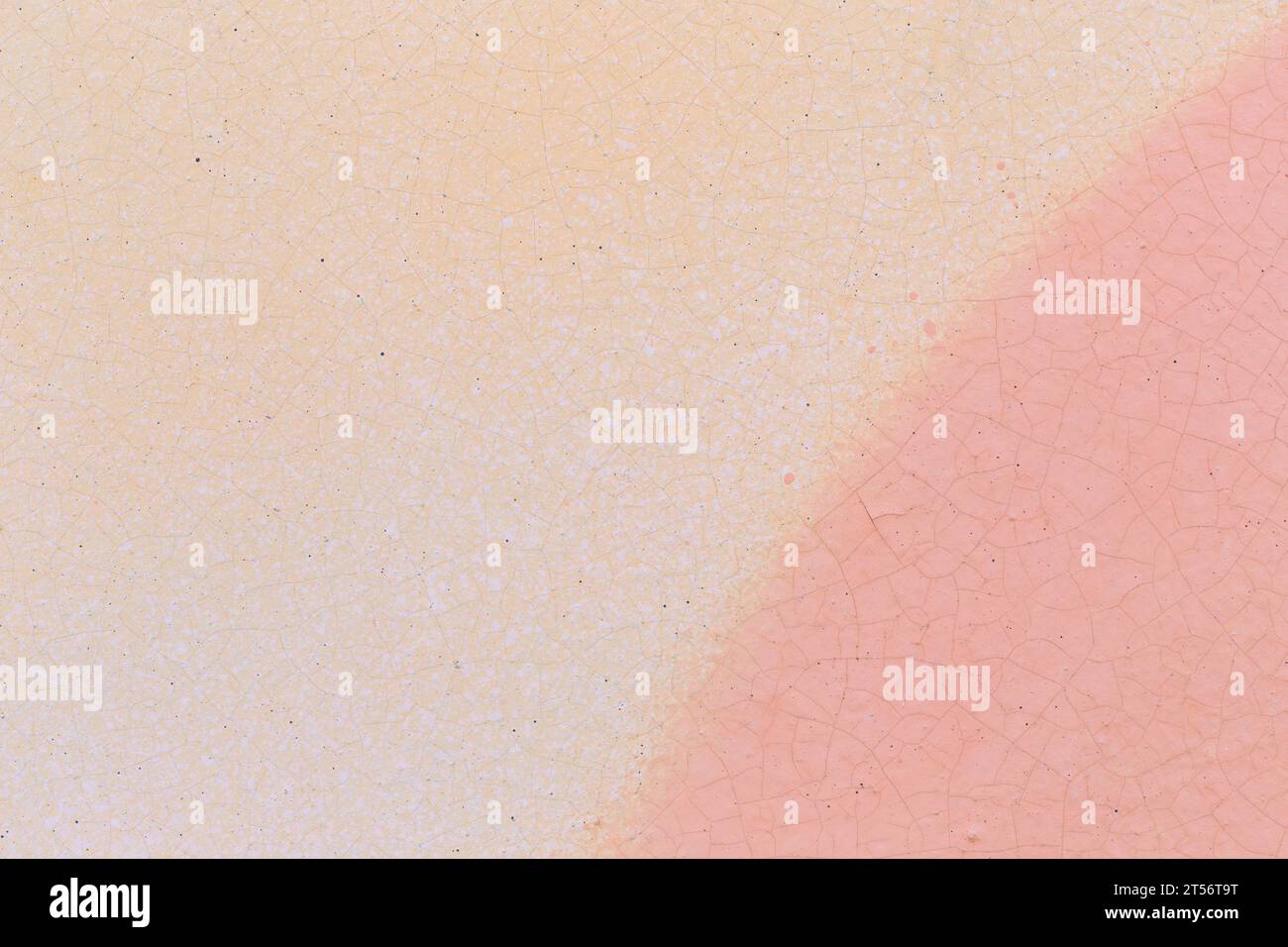 Macro close-up of pale pink spray paint with splashes on a white ...