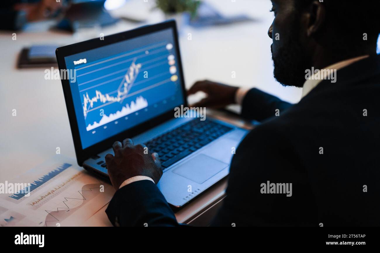 Business trader team doing stock market analysis inside hedge fund ...