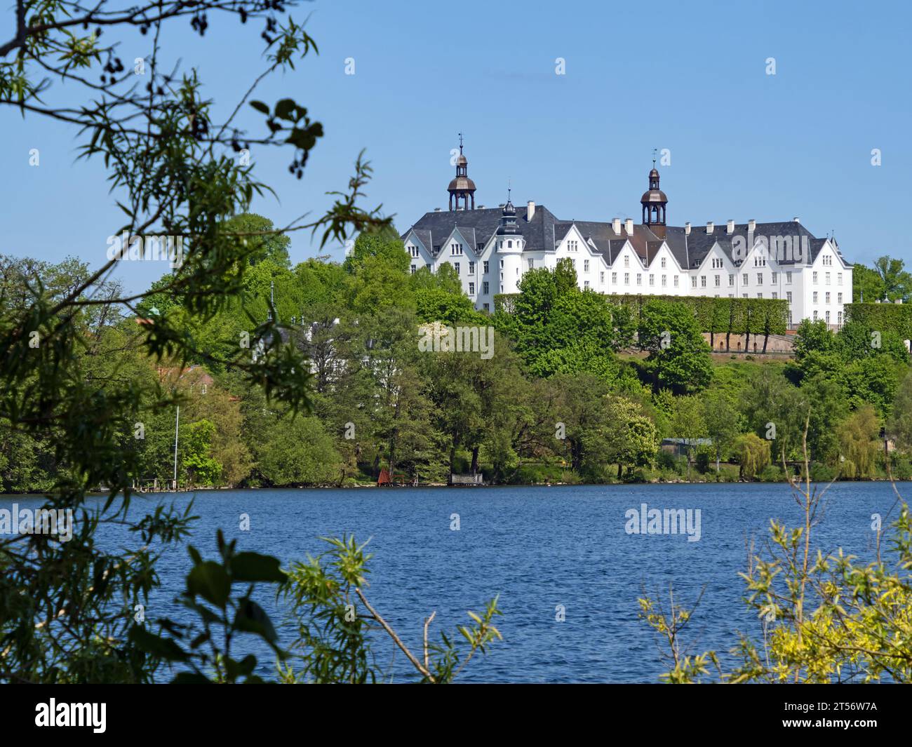 View of the big lake Ploen and the Ploen castle in Schleswig-Holstein ...