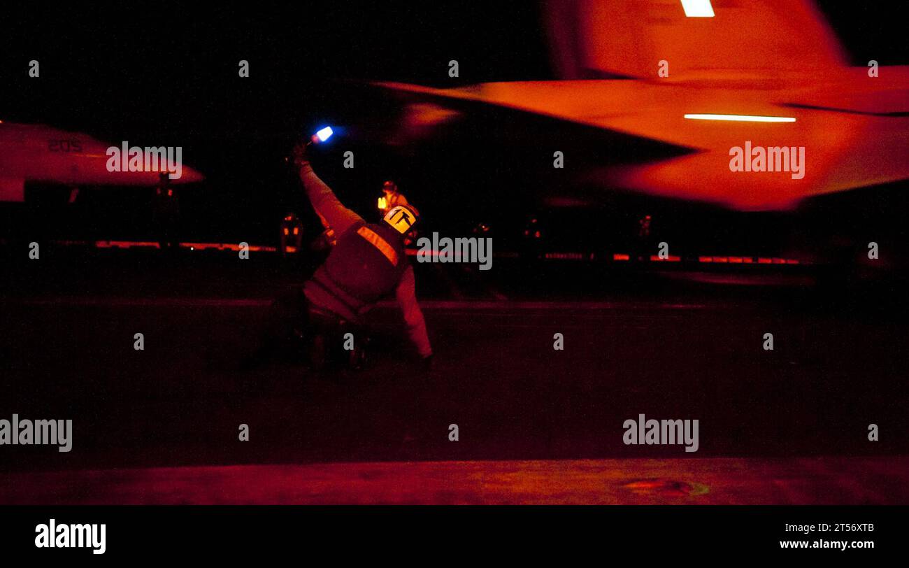 US Navy A final checker signals safe to launch for an F18F Super Hornet ...