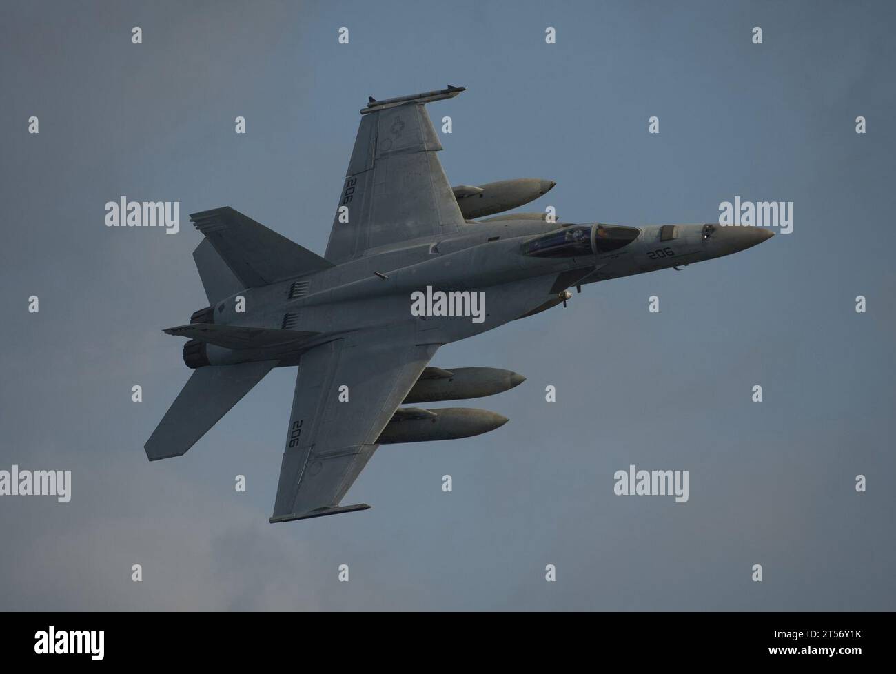US Navy A jet conducts a fly over while underway.jpg Stock Photo - Alamy