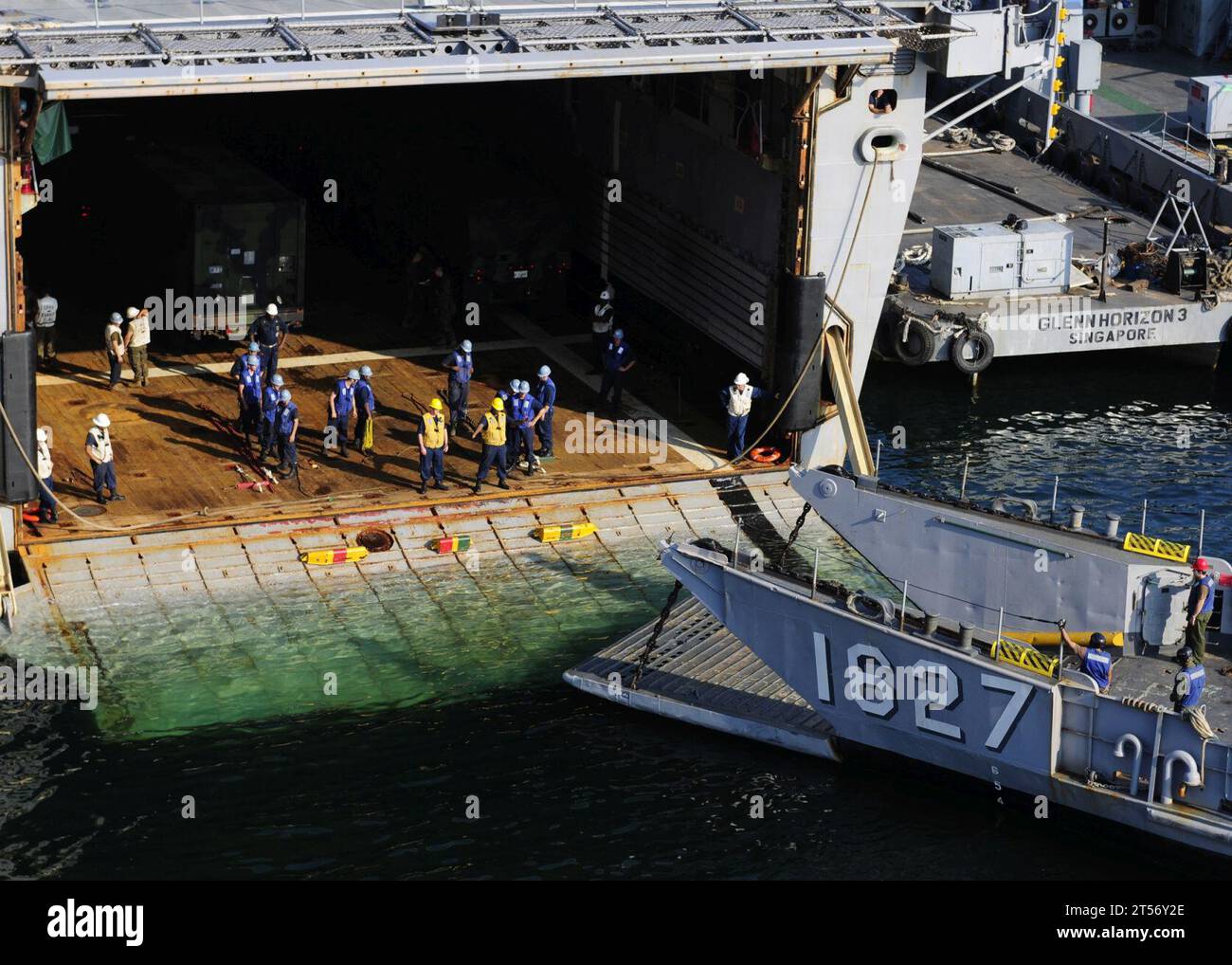 US Navy A landing craft utility approaches the well deck of the ...