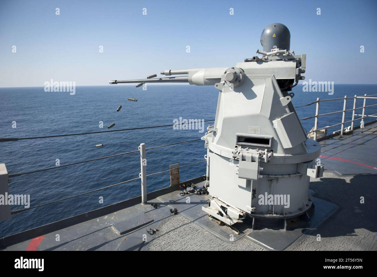 US Navy A Mk 38 MOD 2 25mm machine gun system aboard the amphibious ...