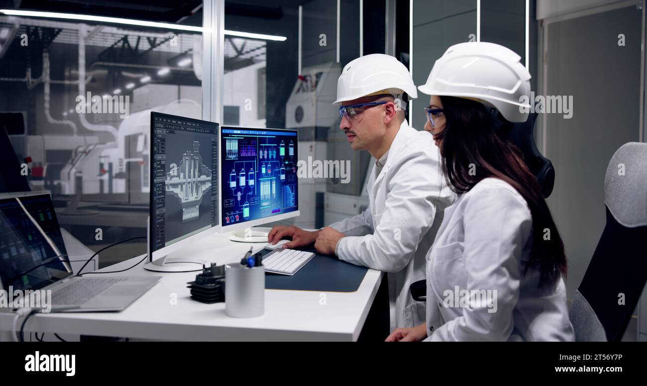 Engineer Doing 3D CAD Model Design On Computer At Factory Stock Photo ...