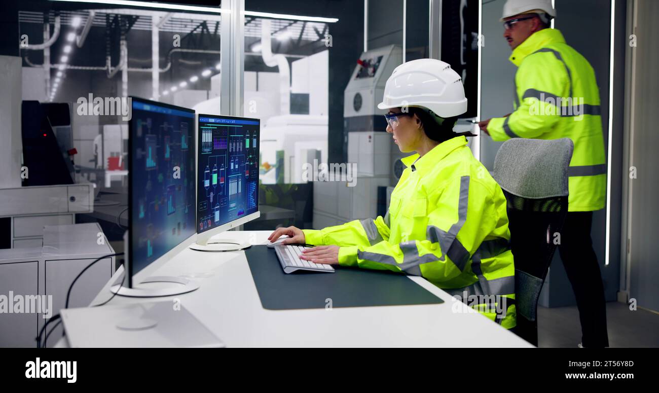 Engineer Operators Using Scada System At Industrial Plant Stock Photo - Alamy