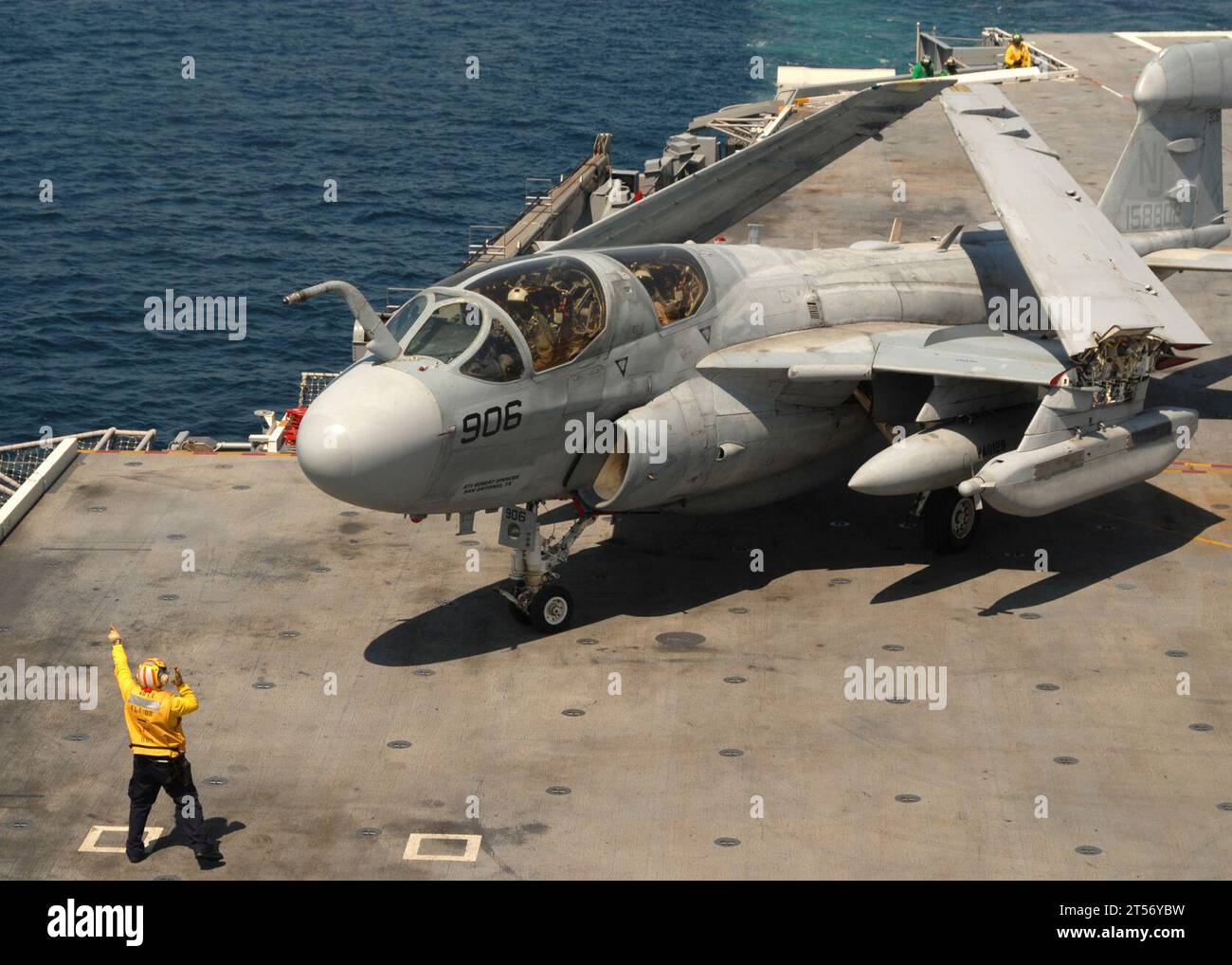US Navy A plane director aboard the aircraft carrier USS George H.W ...